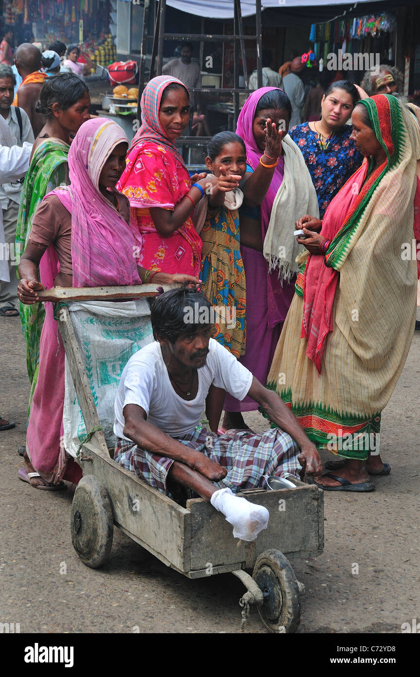 There are many people who need help on the street in the Holy town ...