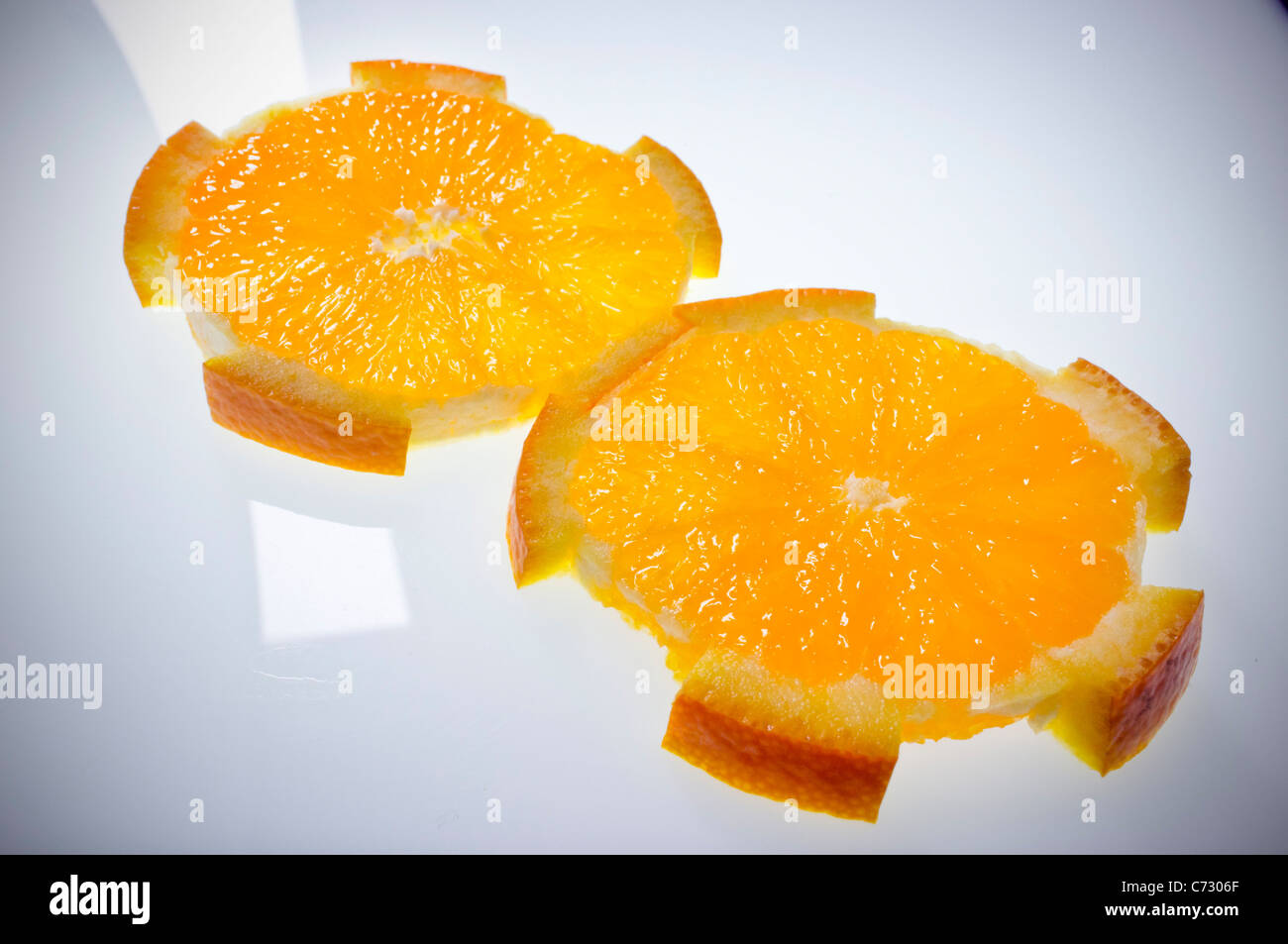 Two orange slices fitting together Stock Photo - Alamy