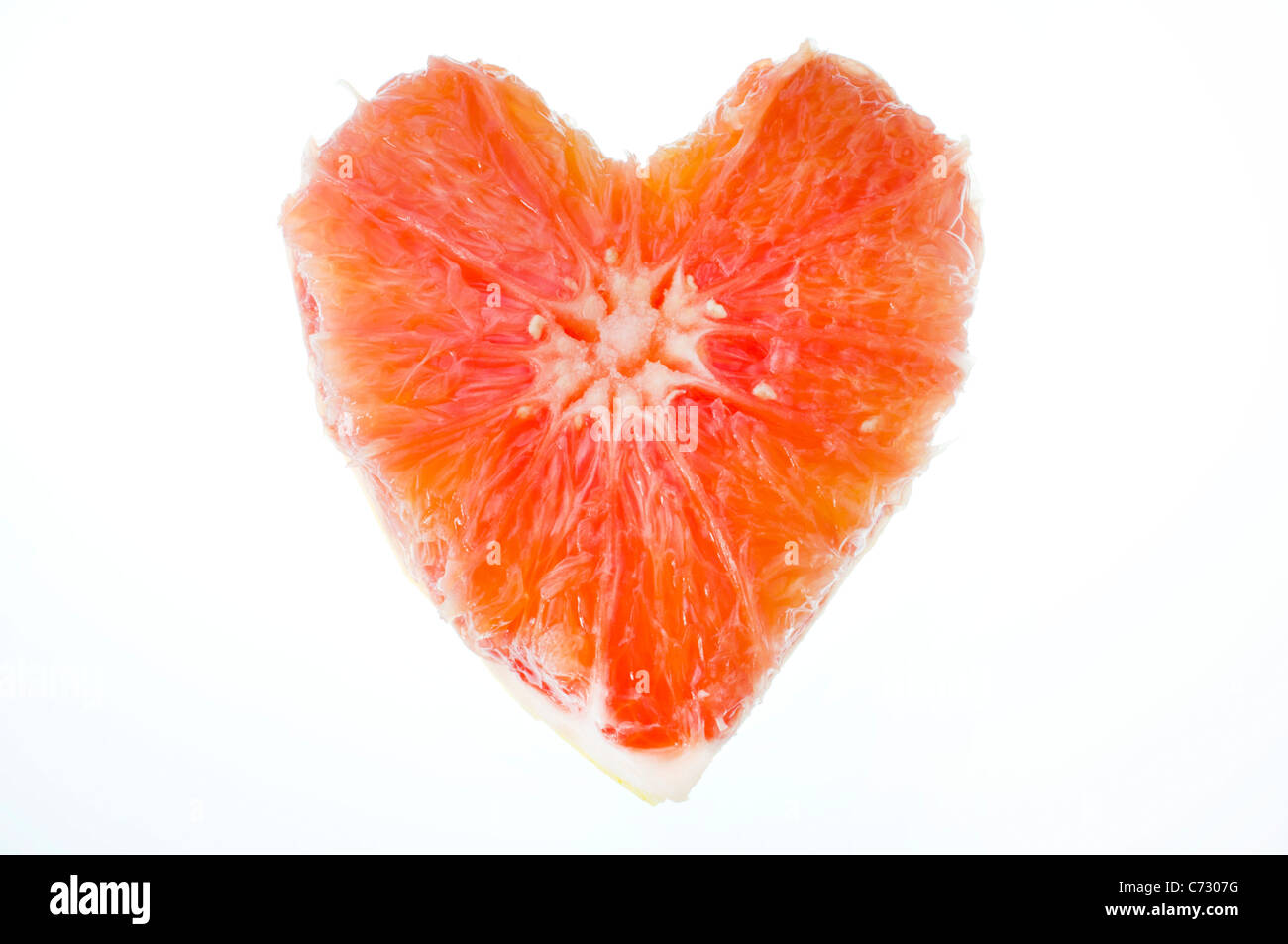 Citrus grapefruit in heart shape Stock Photo - Alamy