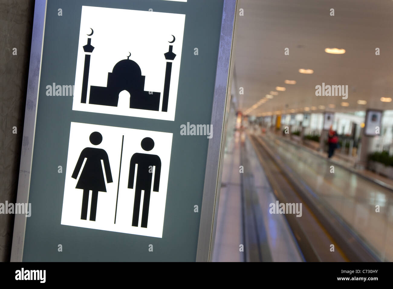 Signs in Abu Dhabi airport indicating location of mosque prayer room ...