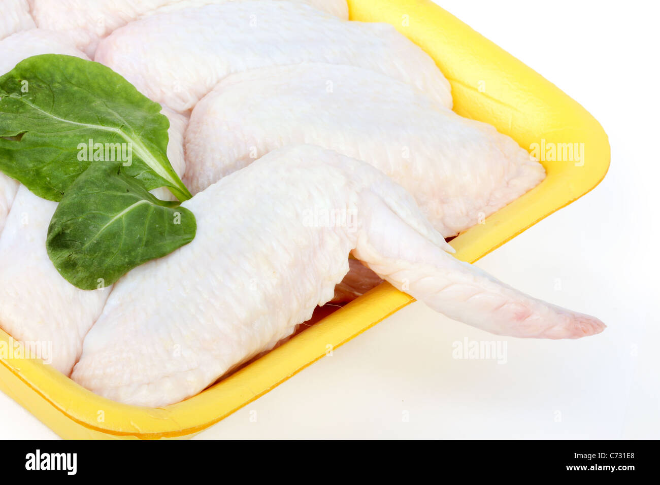 Uncooked chicken wings in package, closeup Stock Photo - Alamy