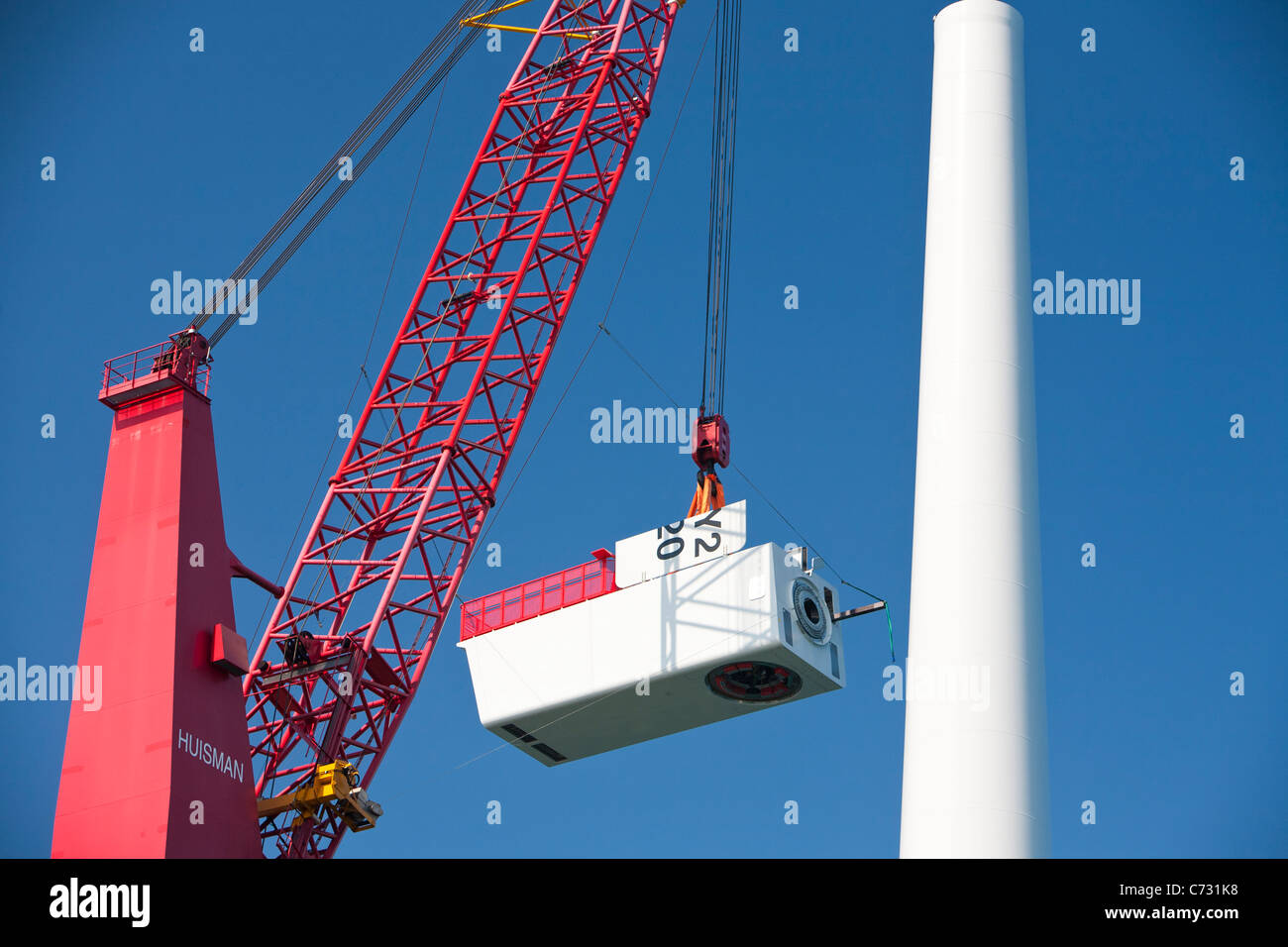lifting a nacelle into place from a jack up barge, constructing the ...