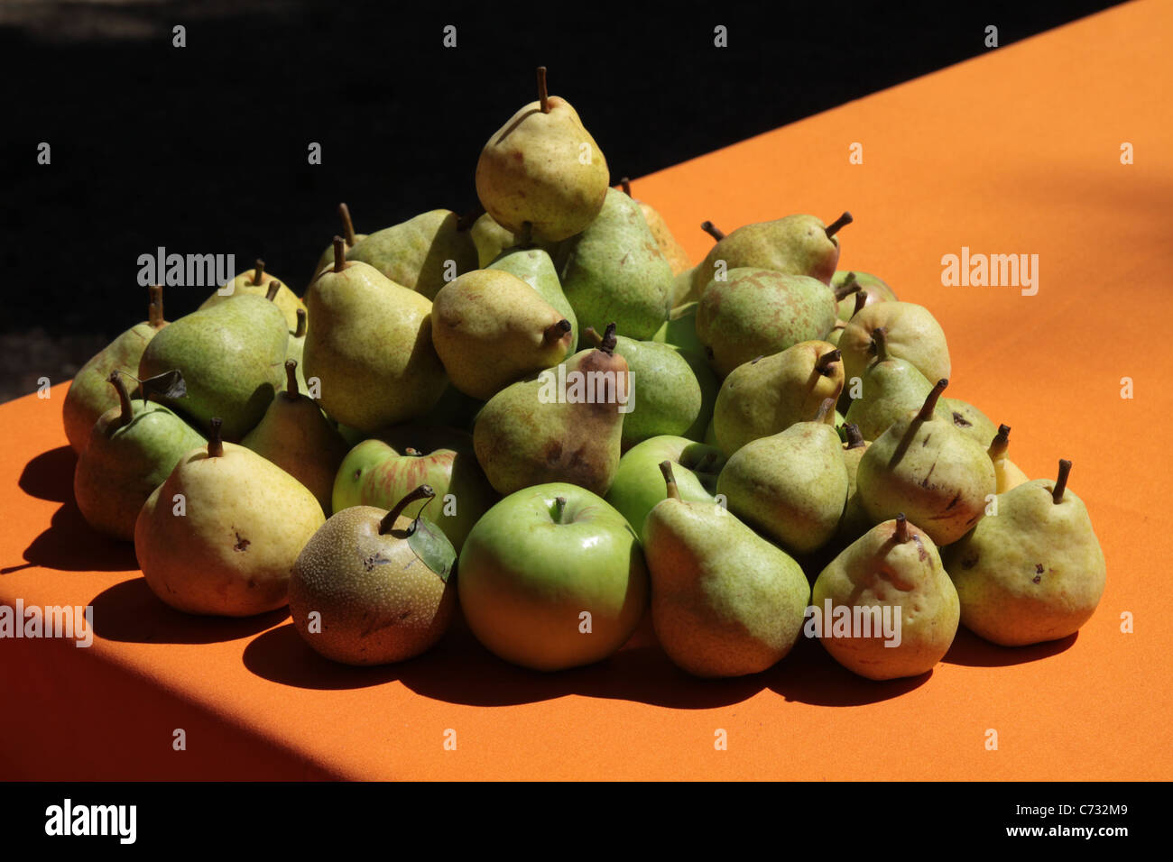 A stack of pears on a table Stock Photo - Alamy