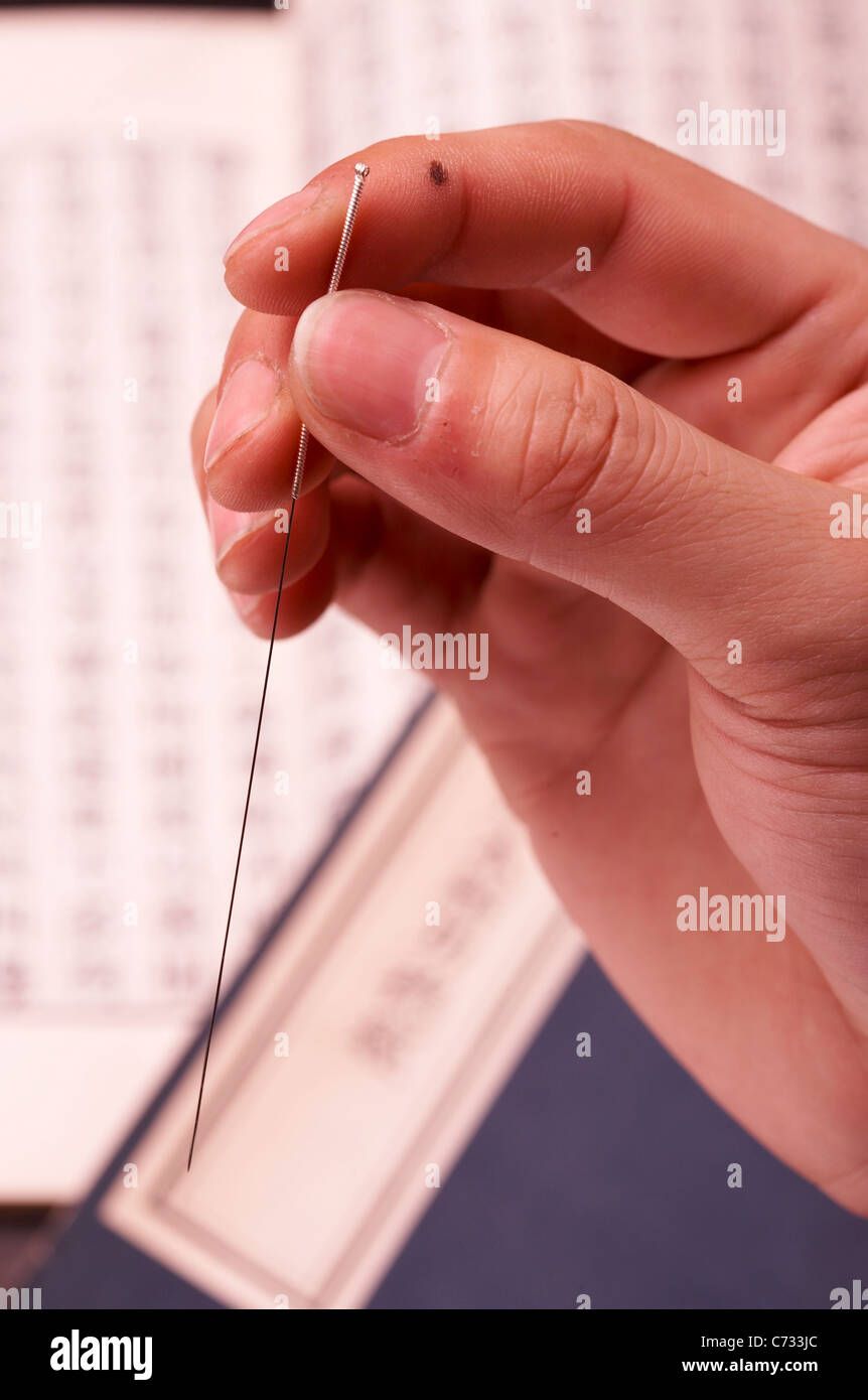 Hand acupuncture hi-res stock photography and images - Alamy