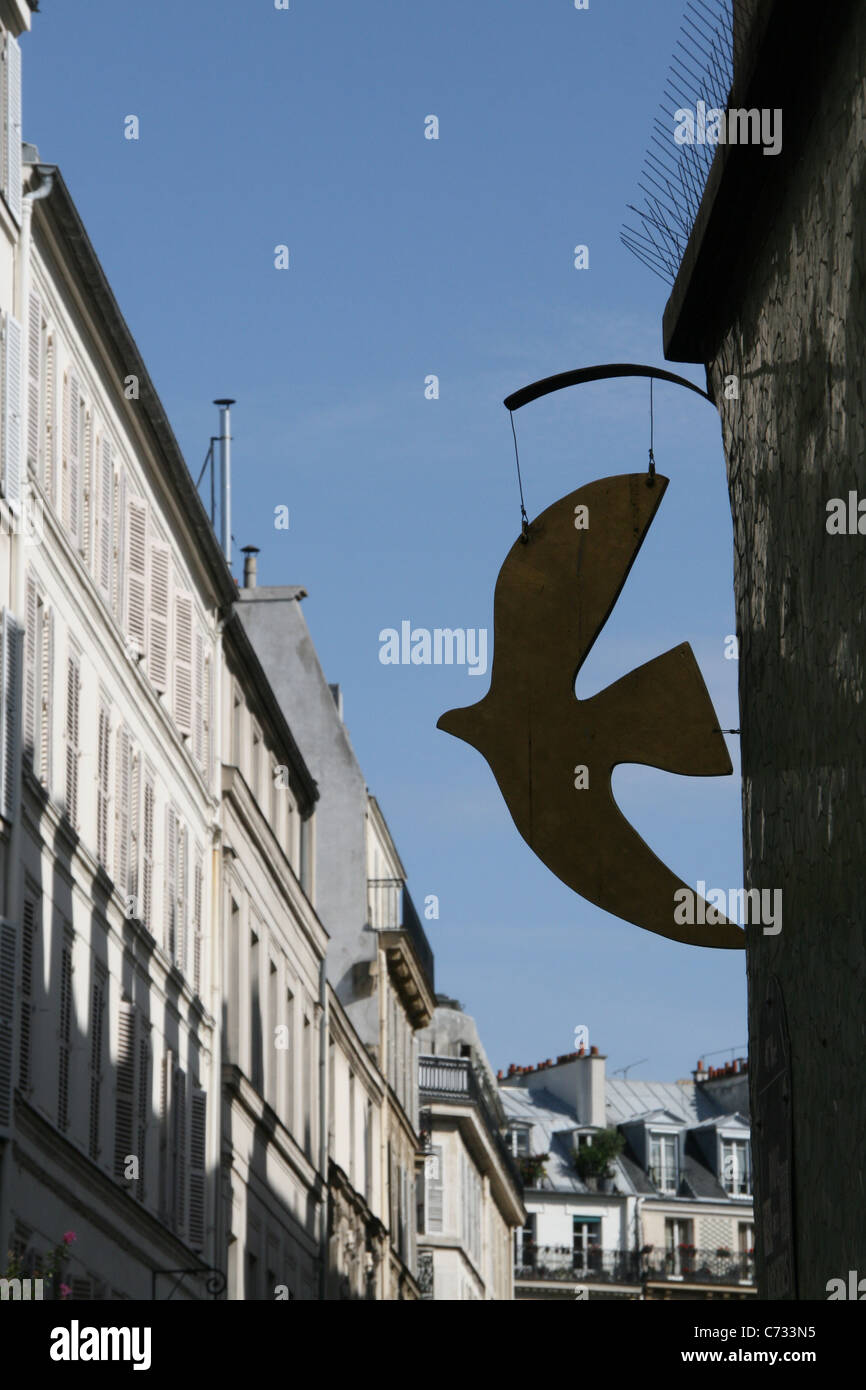 flying bird symbol in the jewish quarter in paris france Stock Photo ...