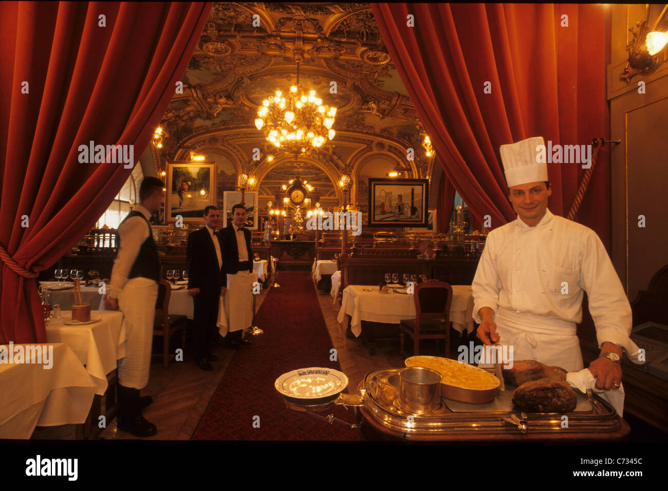 Cook and waiters at the restaurant Le Train Bleu, built for the 1900 ...