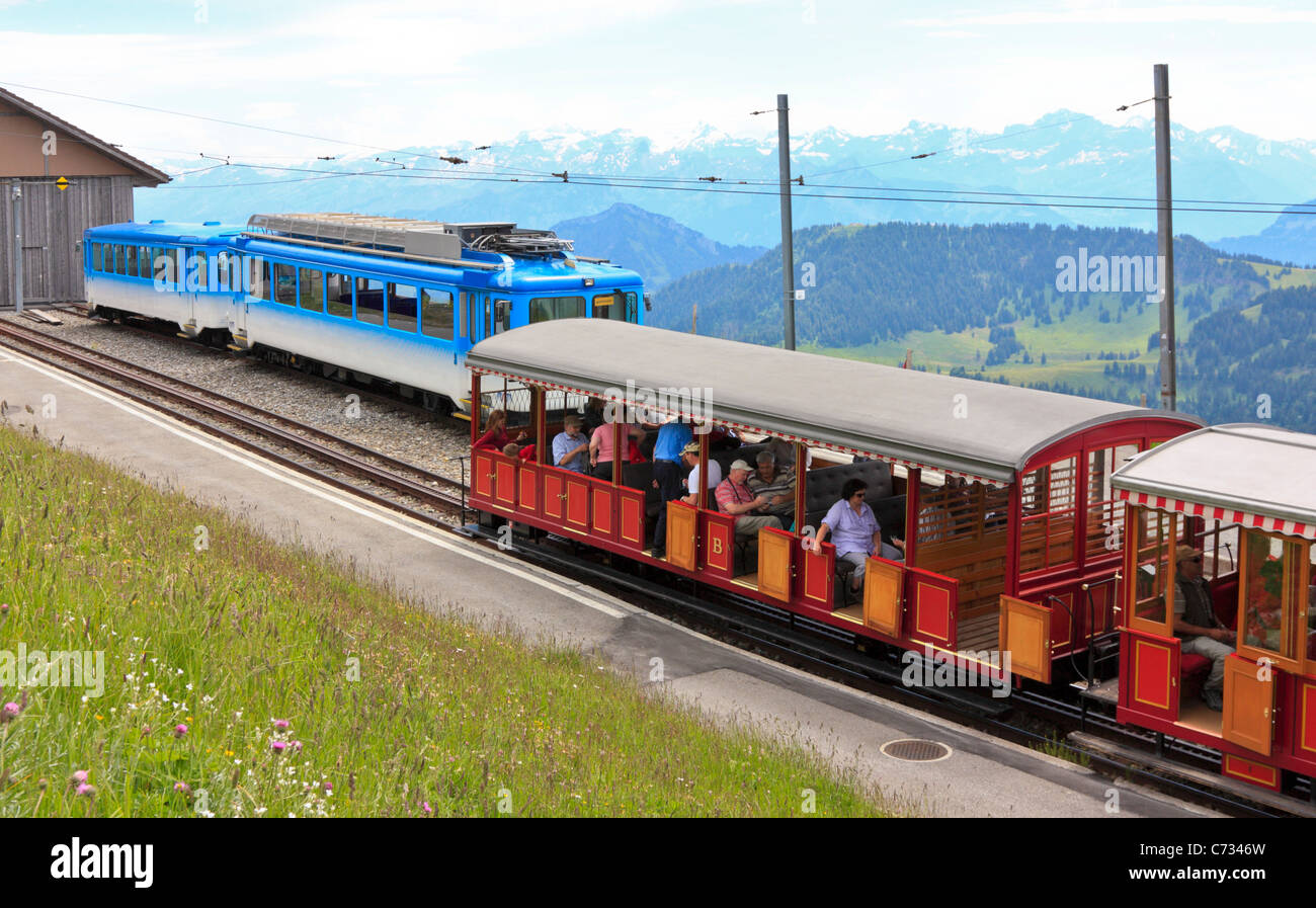 Two trains of the Rigi Mountain Railway at the Mount Rigi Peak Station ...