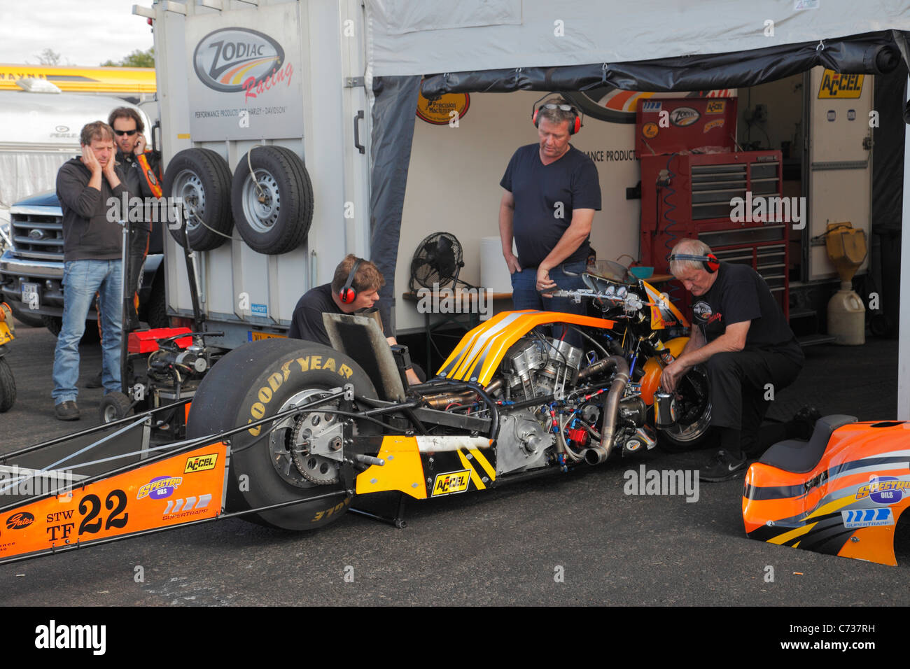 Mechanics testing a Super Twin dragster motorcycle Stock Photo - Alamy