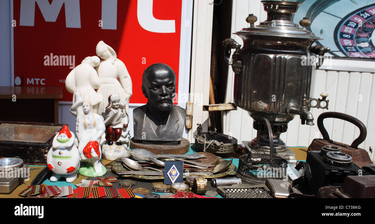 antique porcelain figurines, a bust of Lenin and a samovar, a flea ...