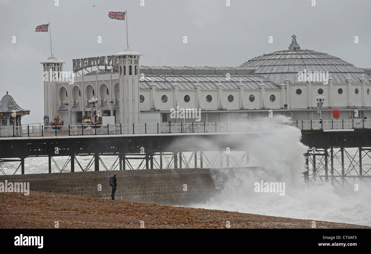 Huge waves crash on to Brighton seafront near the pier as the remnants ...