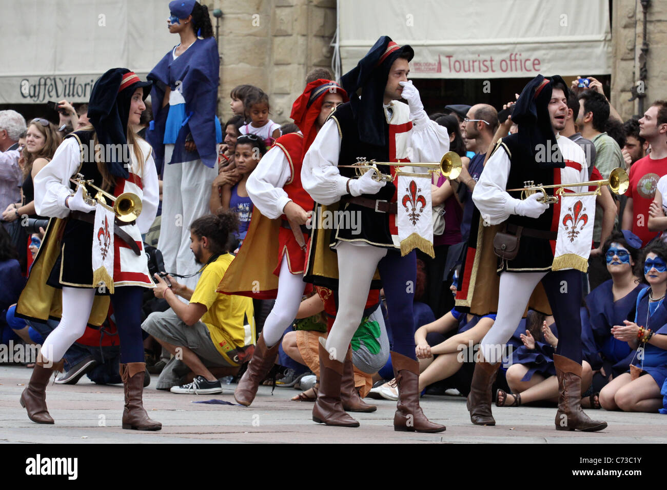 FESTIVAL: medieval dressed men with trumpet parade around Stock Photo ...