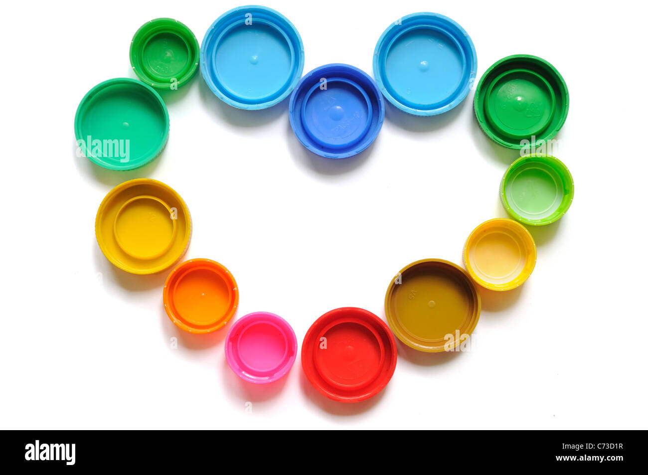 colorful heart shape made of bottle caps Stock Photo - Alamy