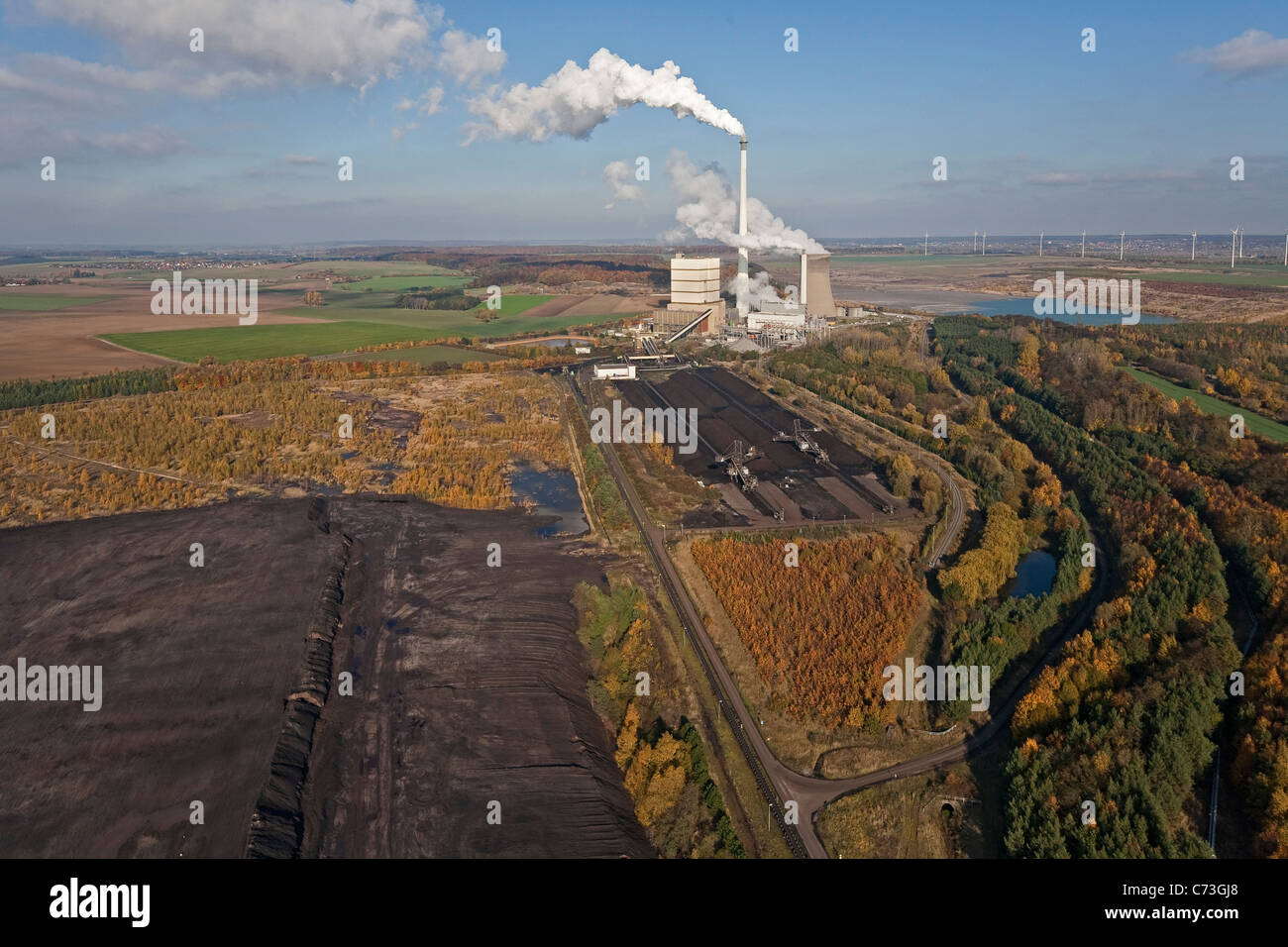Aerial view of a lignite open-pit mine at fossil-fuel power station ...