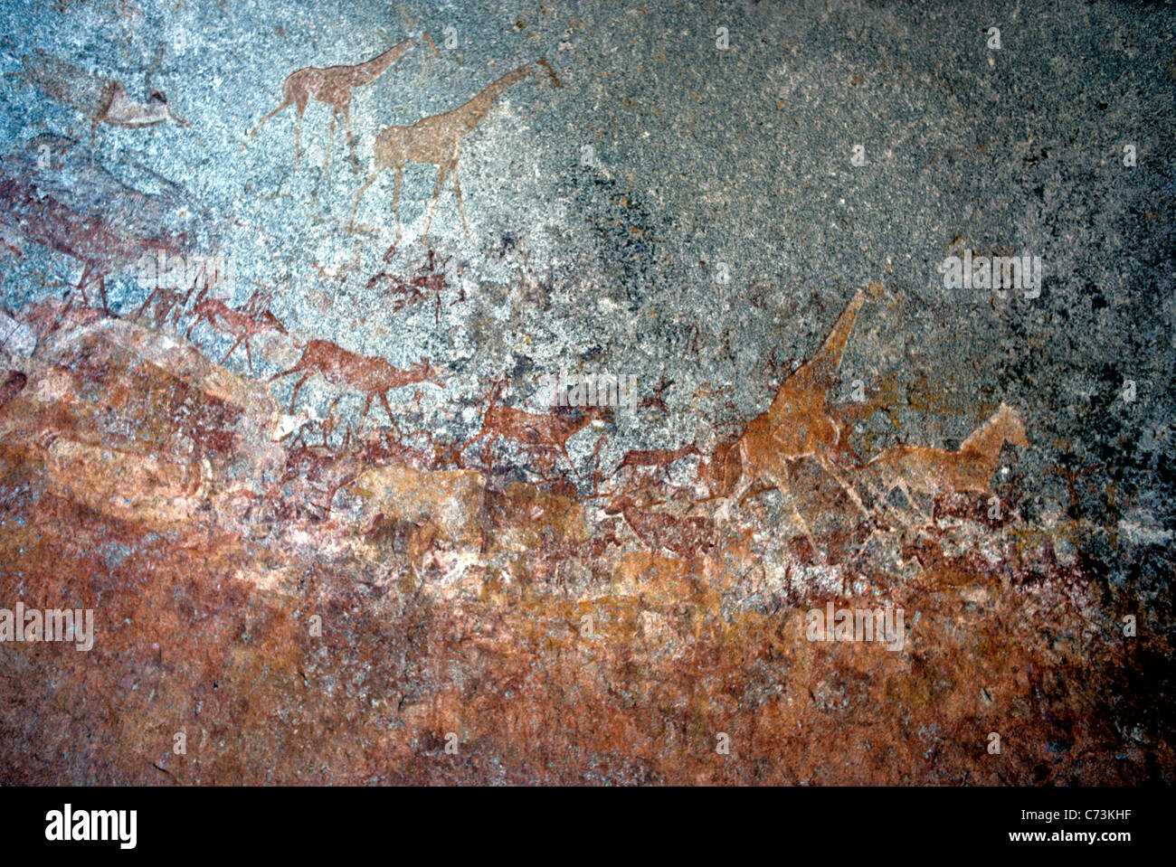 Frieze of Bushman paintings in Nswatugi Cave in the Matopo Hills of ...