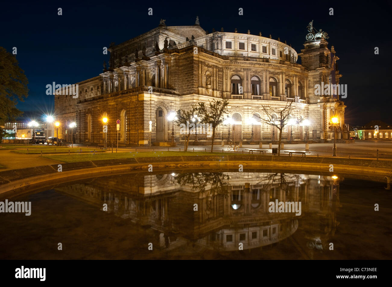 Semper Opera House at night with a reflection in water, Dresden, Saxony ...