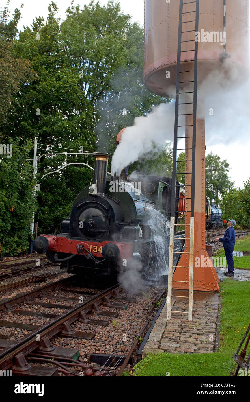 steam engine number 1340 trojan filling up with water Stock Photo - Alamy