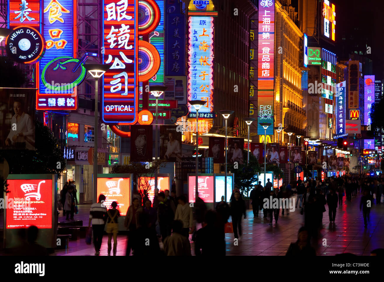Neon signs above shops along Nanjing Road, Shanghai, China Stock Photo ...