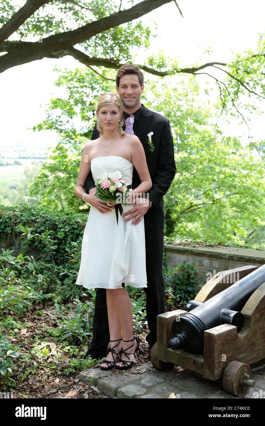 just married 25 year old german bride and her 29 year old groom nearby ...