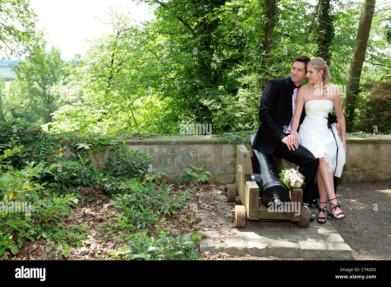 just married 25 year old german bride and her 29 year old groom sitting ...