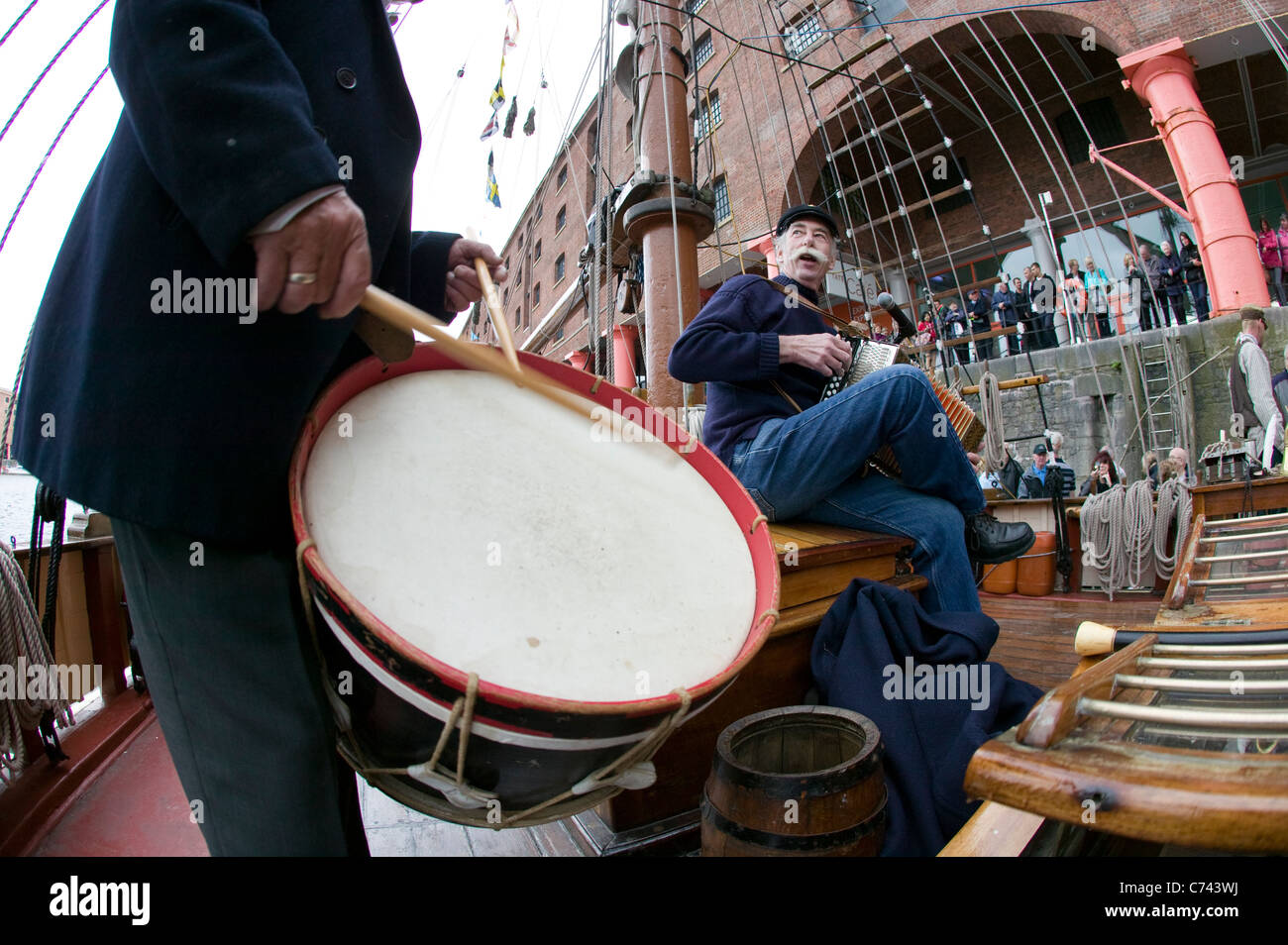 Drummer and accordion players as part of tall ships River Festival at ...