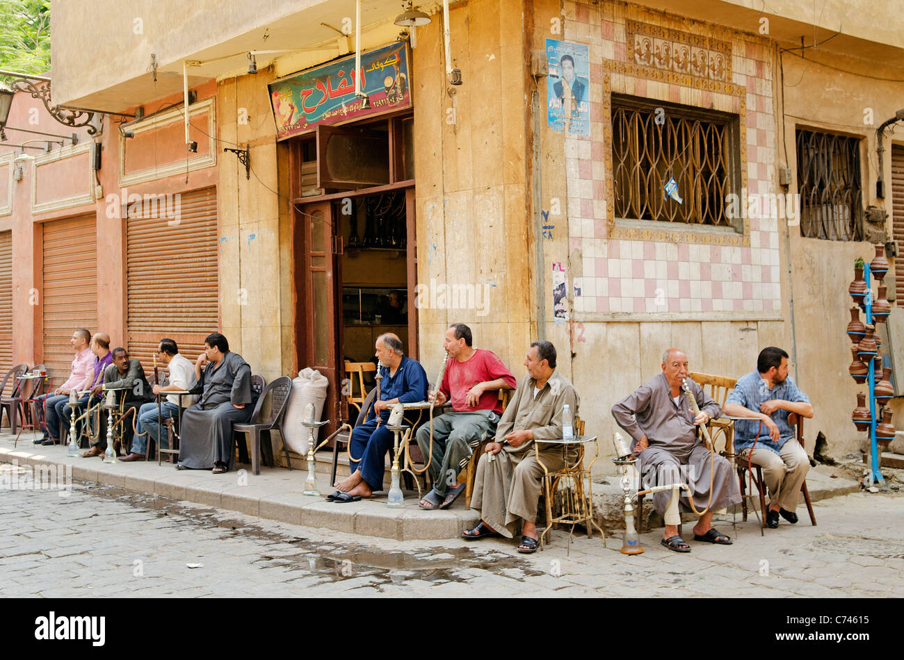 men smoking shisha in cairo old town Stock Photo - Alamy