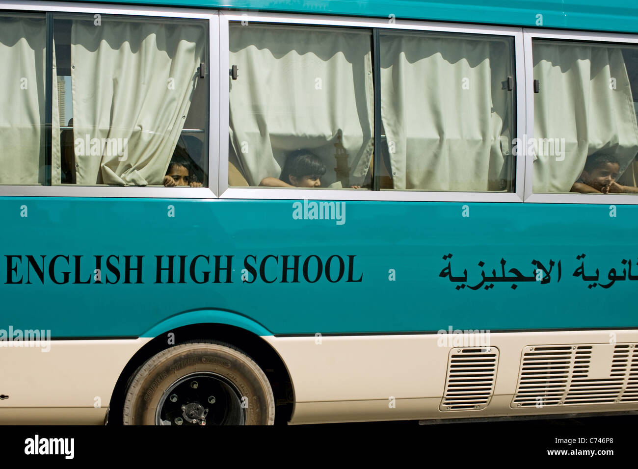 Children in a school bus Dubai United Arab Emirates Stock Photo - Alamy