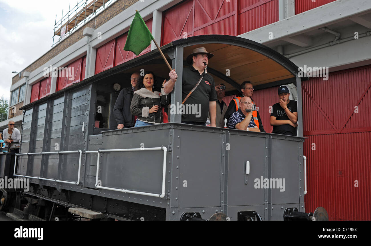 Tourists enjoy a ride on a steam train in the historic Bristol harbour ...