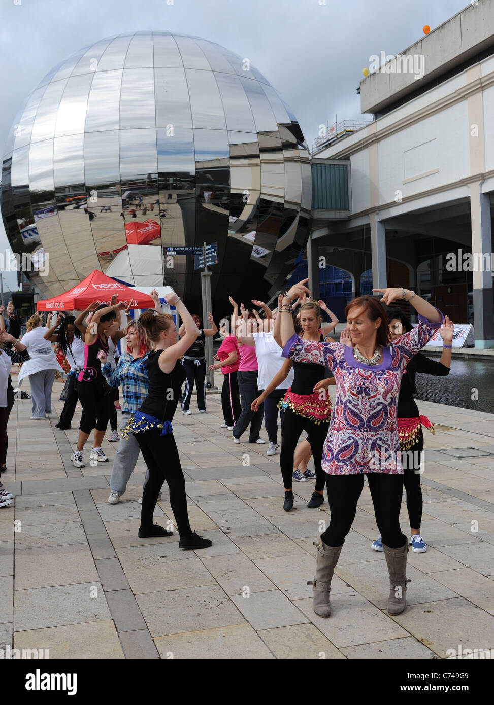 Zumba dance class in Bristol city harbour and pedestrian square for ...