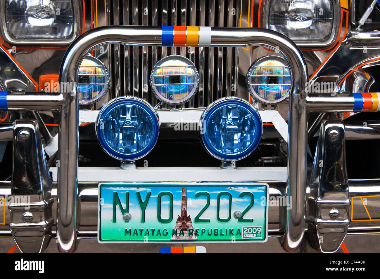 A newly built jeepney at the Sarao motors factory, Las Pinas, near ...