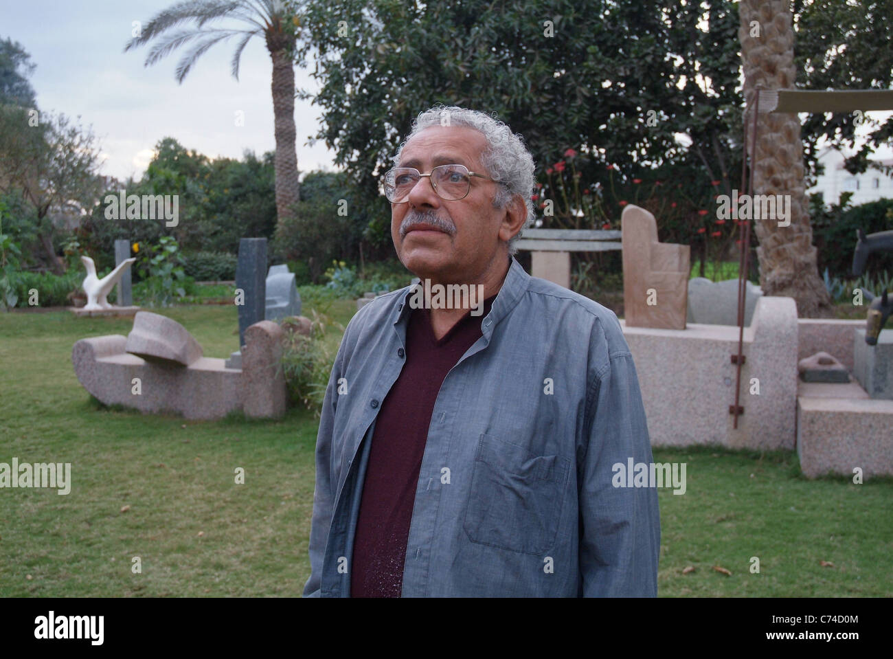Haraniyya, Egypt -- Jan 2006 -- Egyptian sculptor Adam Henein at work ...