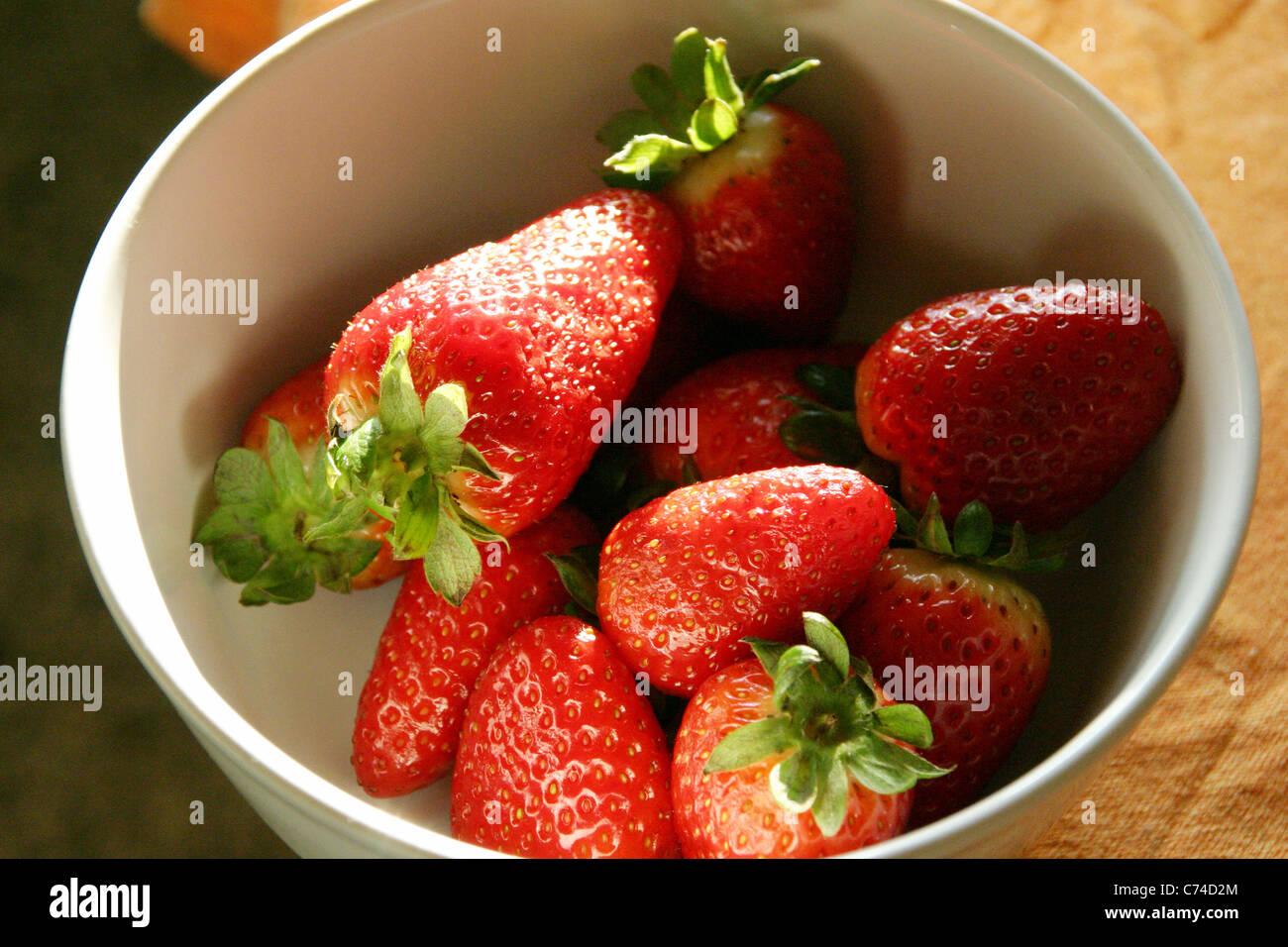 Strawberries in a bowl Stock Photo - Alamy