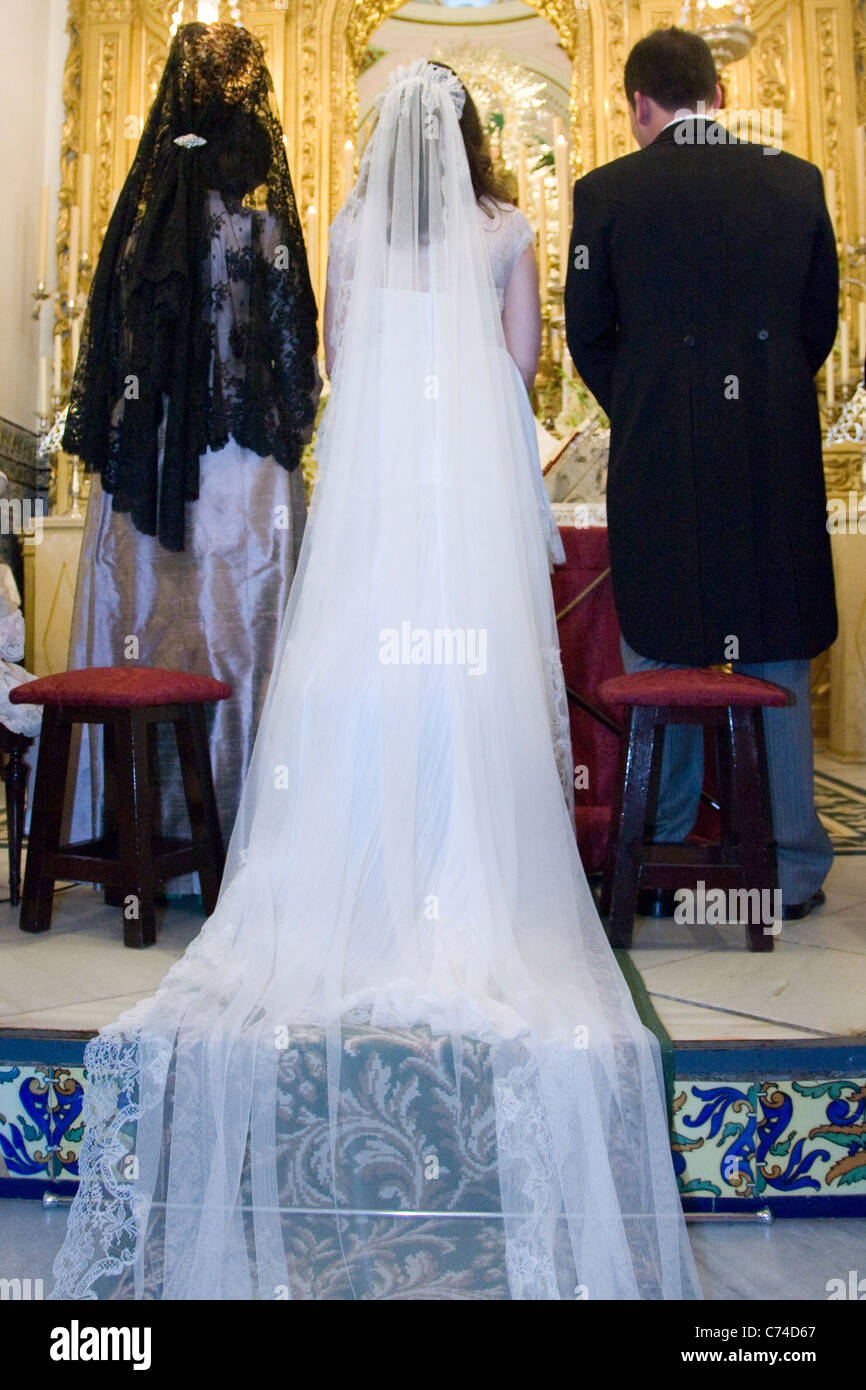 Bride and groom standing at an altar Seville Spain Stock Photo - Alamy
