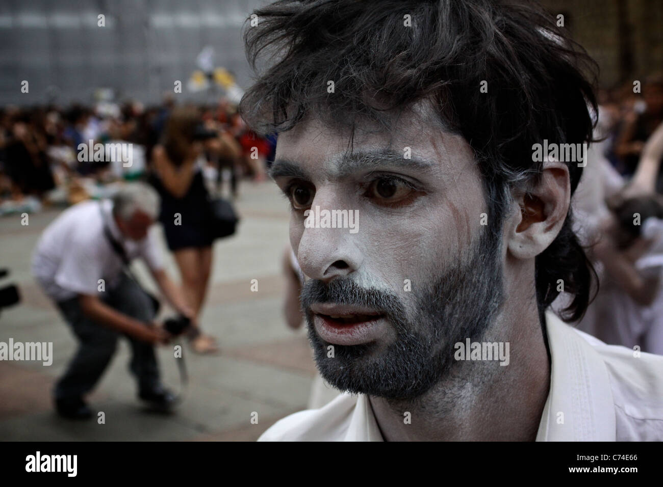 FESTIVAL: Zombie face, man masked as undead with a white painted face ...