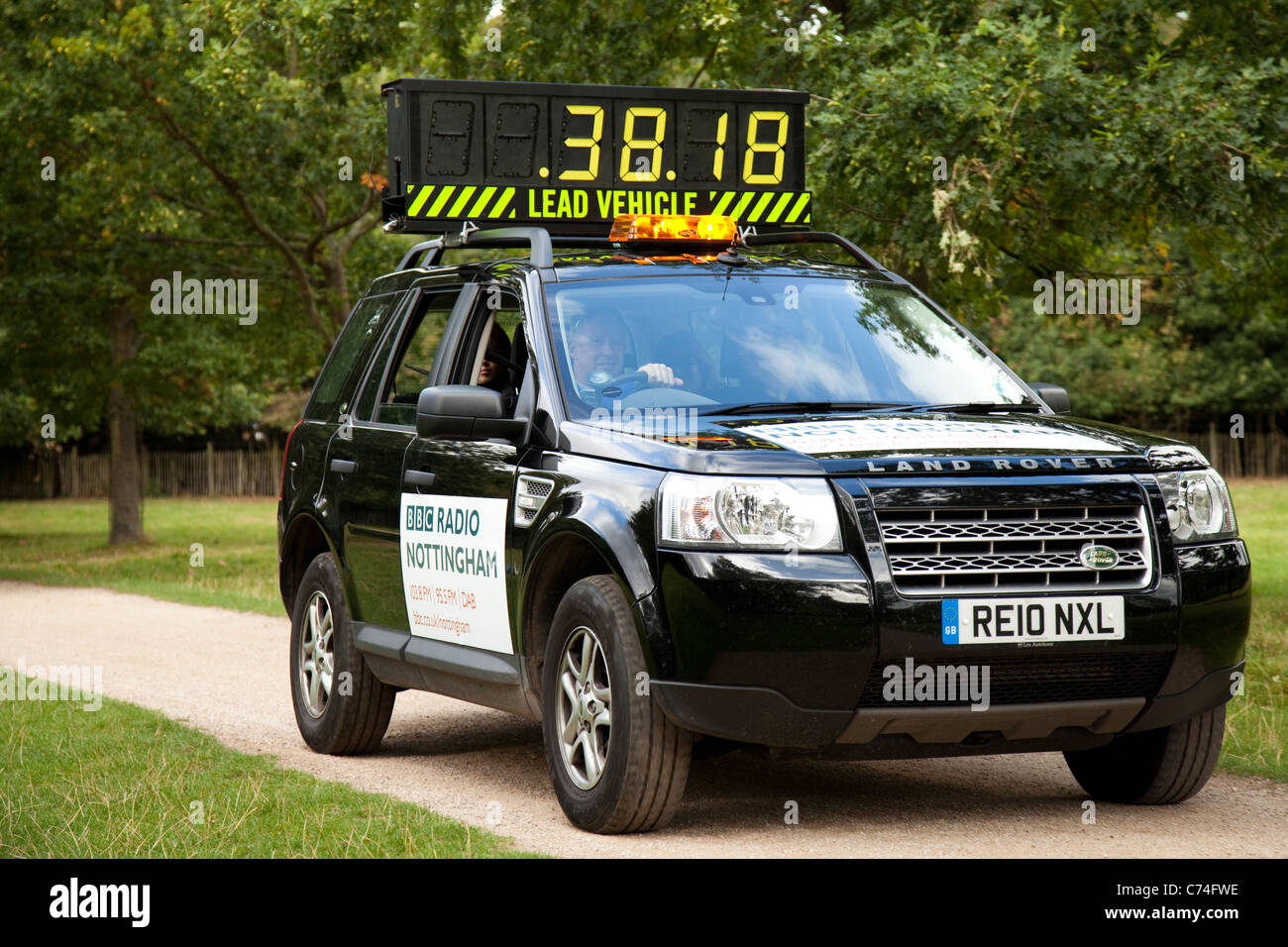 Lead timing vehicle at the Robin Hood Marathon Nottingham England UK ...
