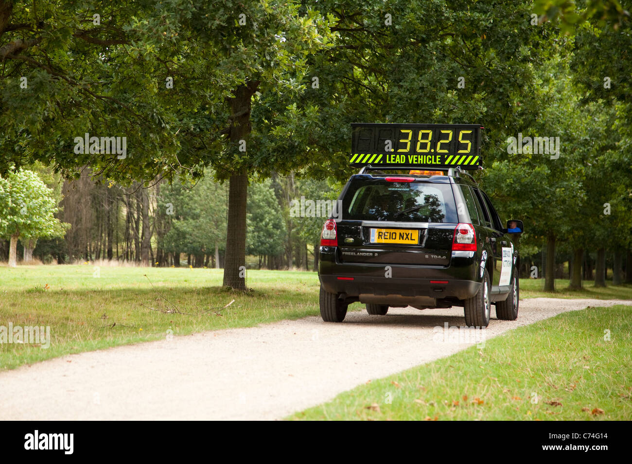 Lead timing vehicle at the Robin Hood Marathon Nottingham England UK ...