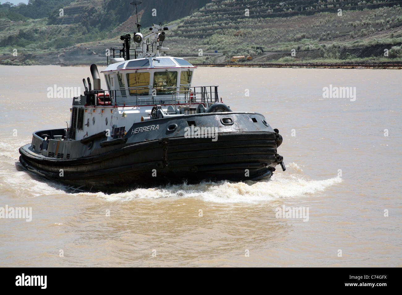 Tugboat operating in the Panama Canal on daytime operations Stock Photo ...