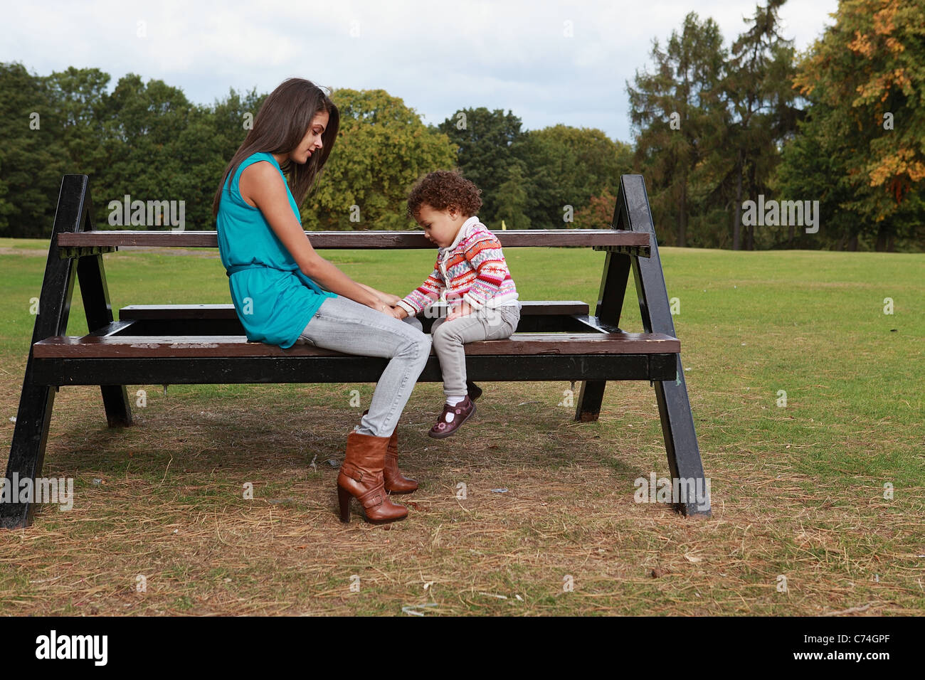 Teen Mom, Mum, Mother with Child, Daughter at the Park Stock Photo - Alamy