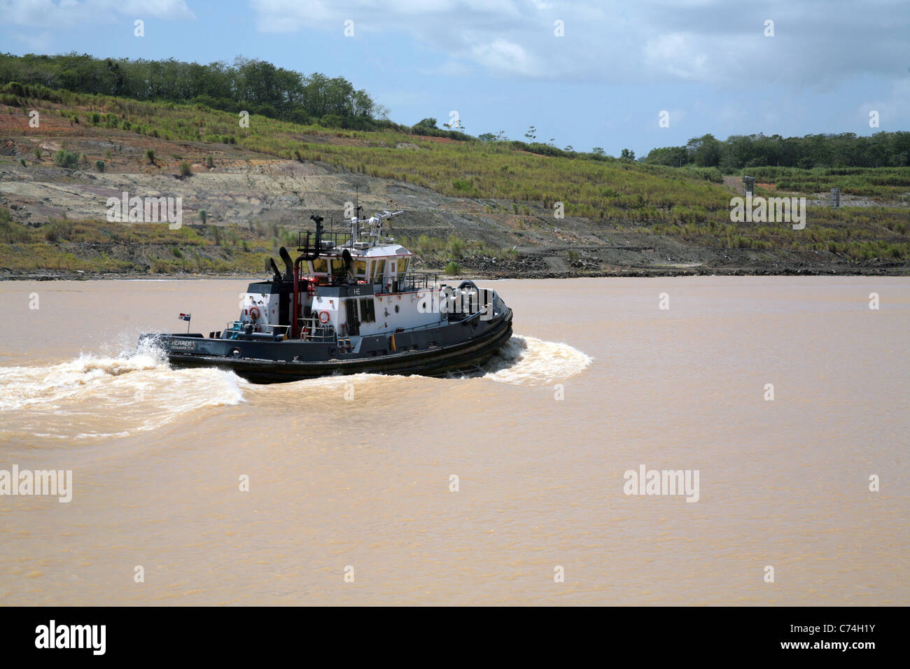 Tugboat operating in the Panama Canal on daytime operations Stock Photo ...