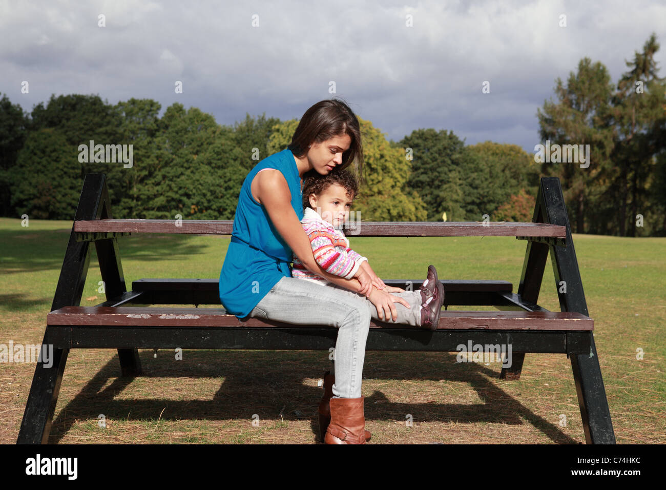 Teen Mom, Mum, Mother with Child, Daughter at the Park Stock Photo - Alamy