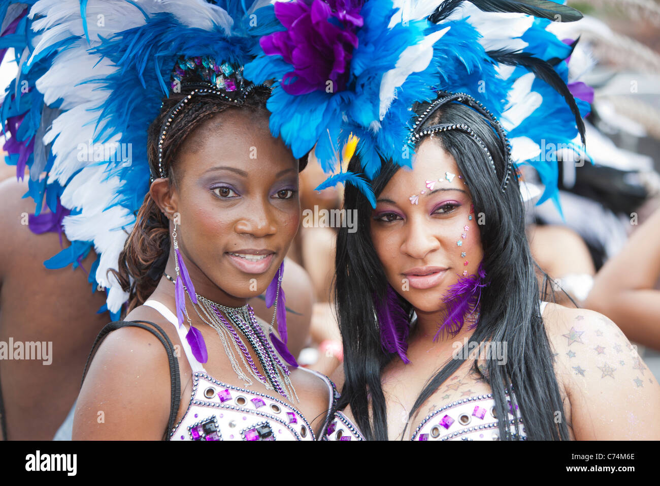 Parade participants in festive attire at the West Indian-American Day ...