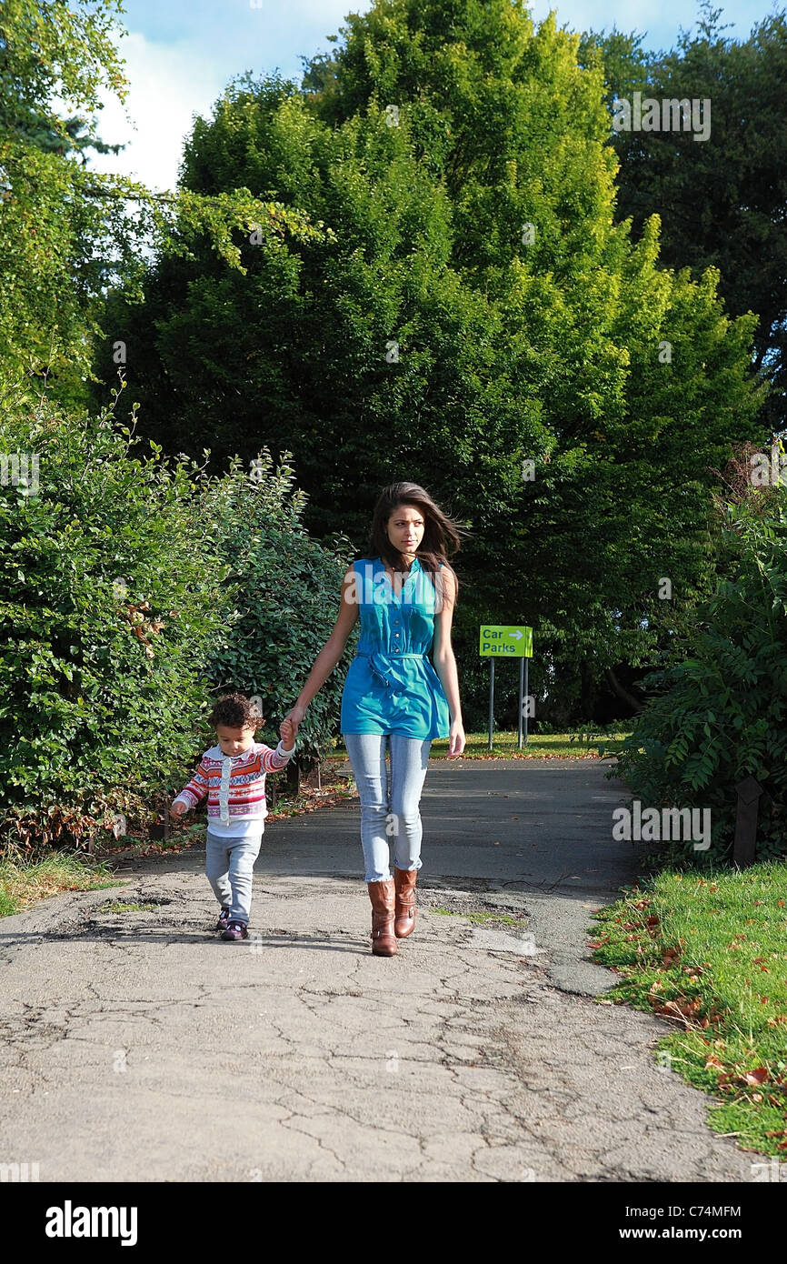 Teen Mom, Mum, Mother with Child, Daughter at the Park Stock Photo - Alamy