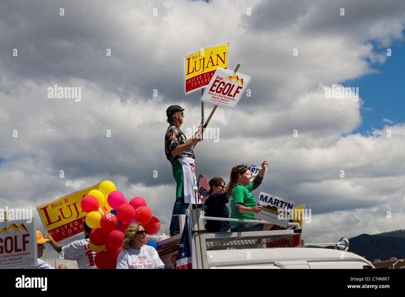 man waving political sign Stock Photo - Alamy