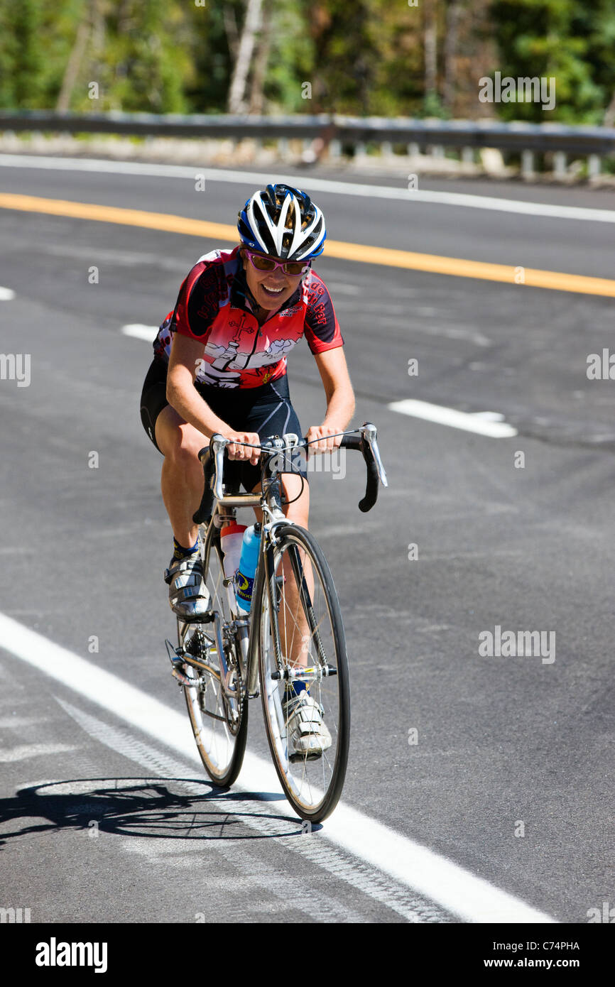 Female recreational cyclist riding over Monarch Pass in Central ...