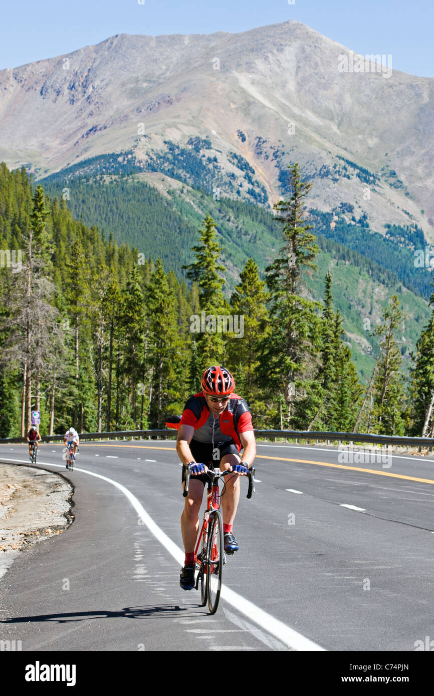 Recreational cyclist riding over Monarch Pass in Central Colorado ahead ...