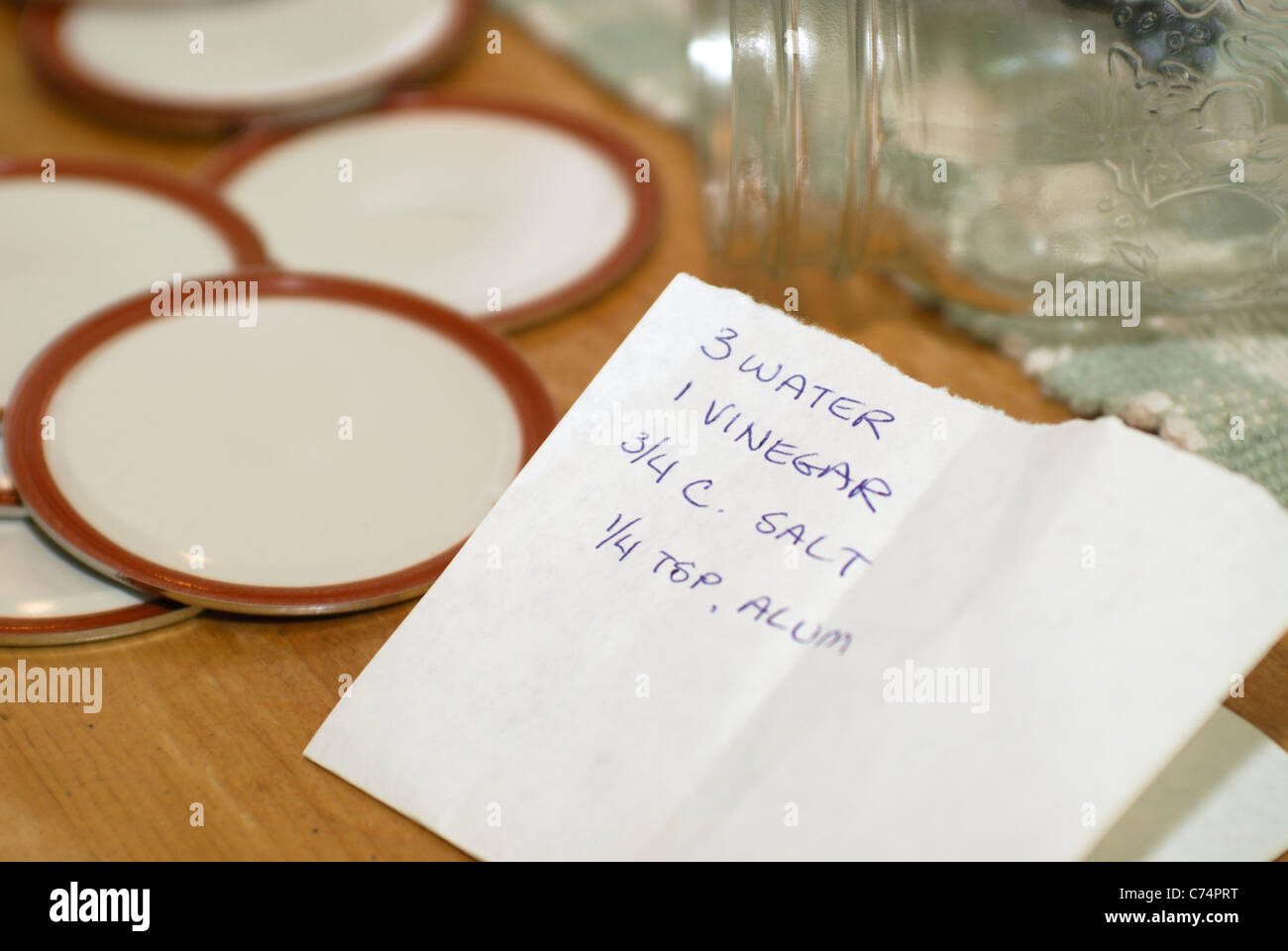 Brine recipe for pickling with jar and sealing tops in background Stock ...