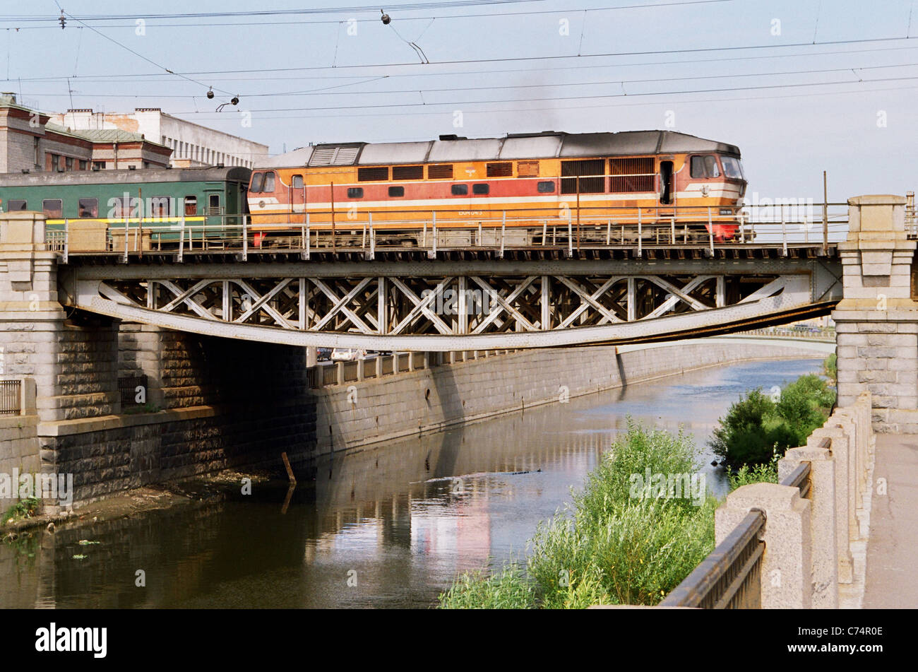 Russia. Saint-Petersburg. Railway Bridge. The diesel locomotive Stock ...