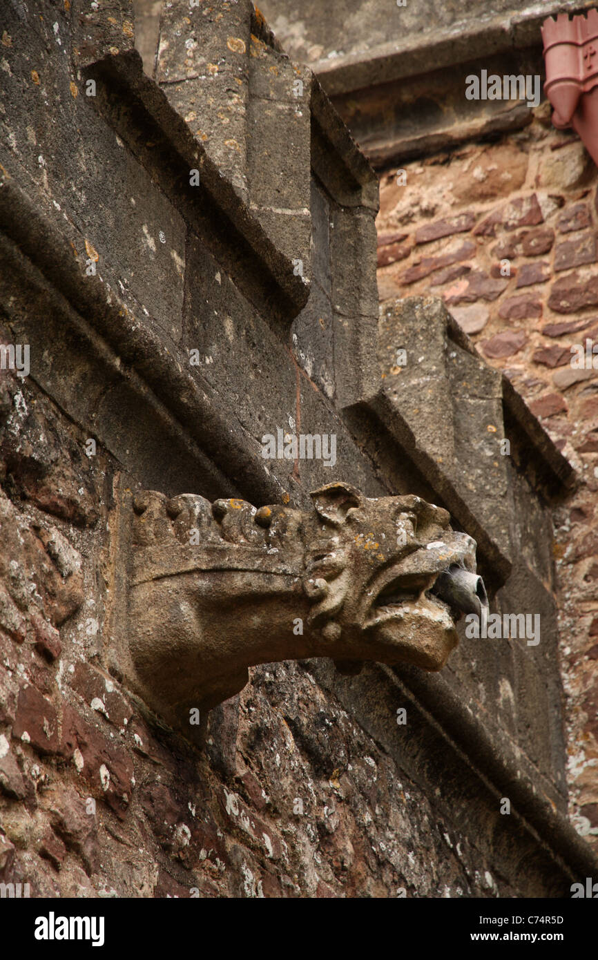 Water Spout Gargoyle on wall of Priory Church of St. George in the ...