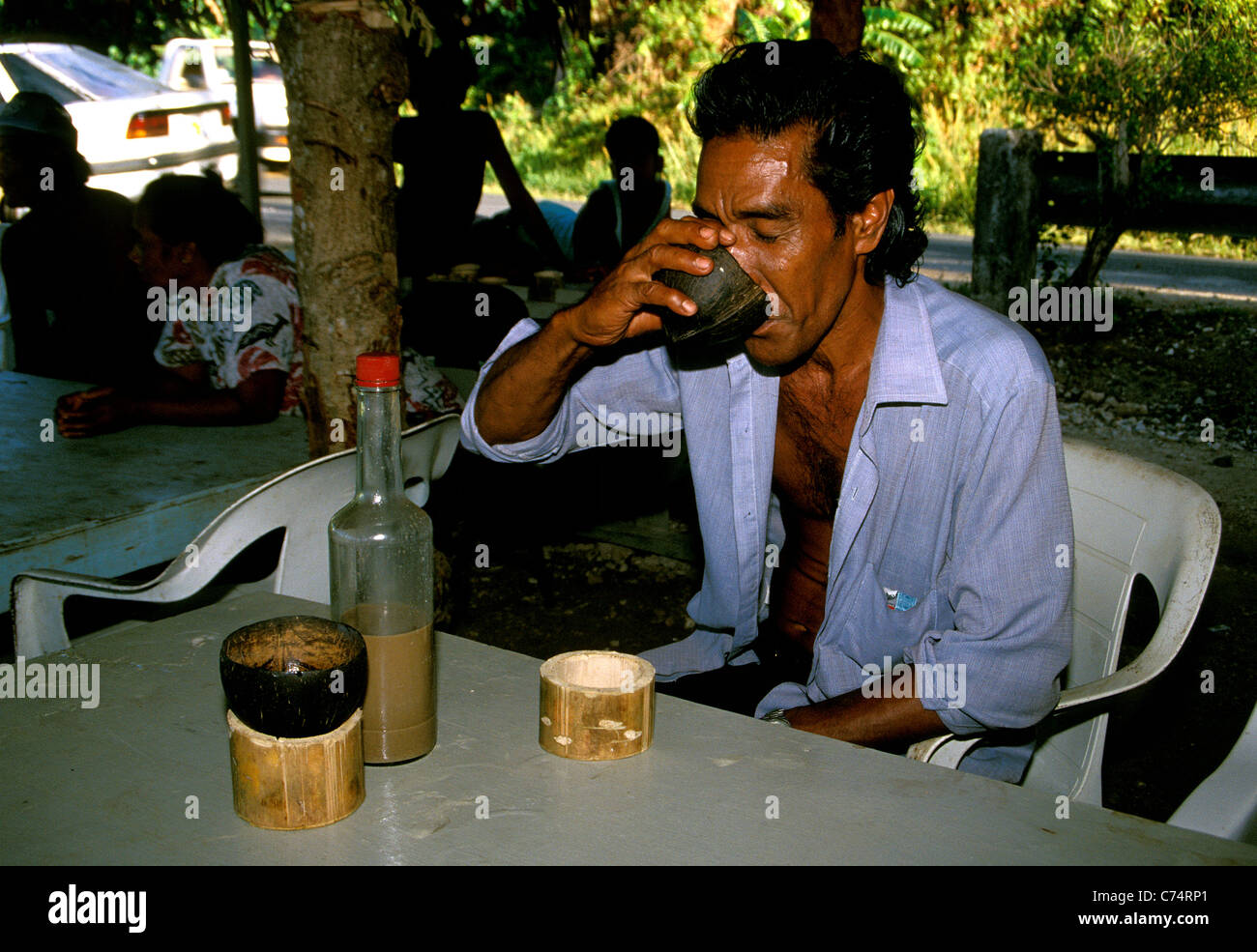 Micronesian man swallowing down sakau, a form of kava, on Pohnpei ...