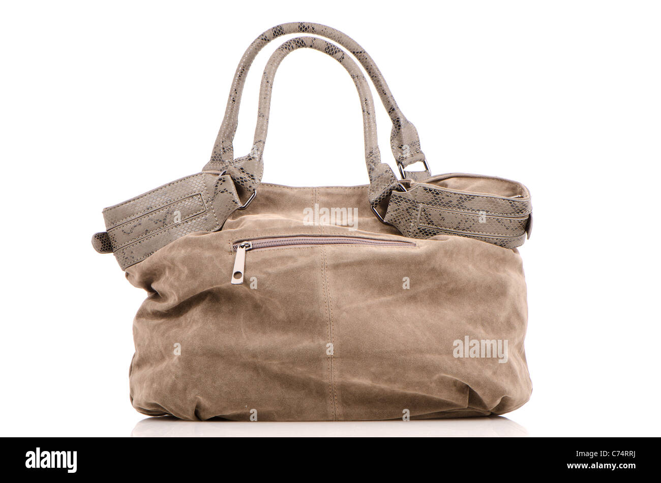 Brown woman bag on white reflective background Stock Photo - Alamy
