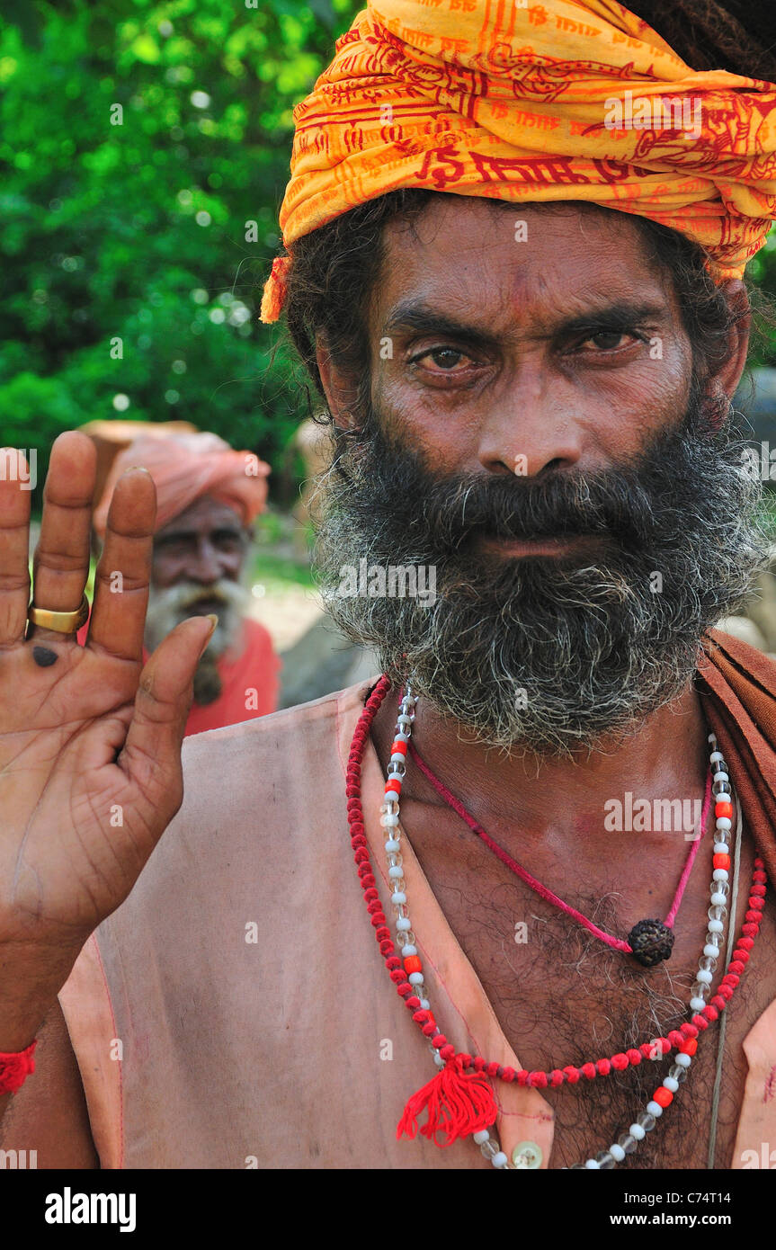 Sadhu by the Ganges river in the holy town Stock Photo - Alamy